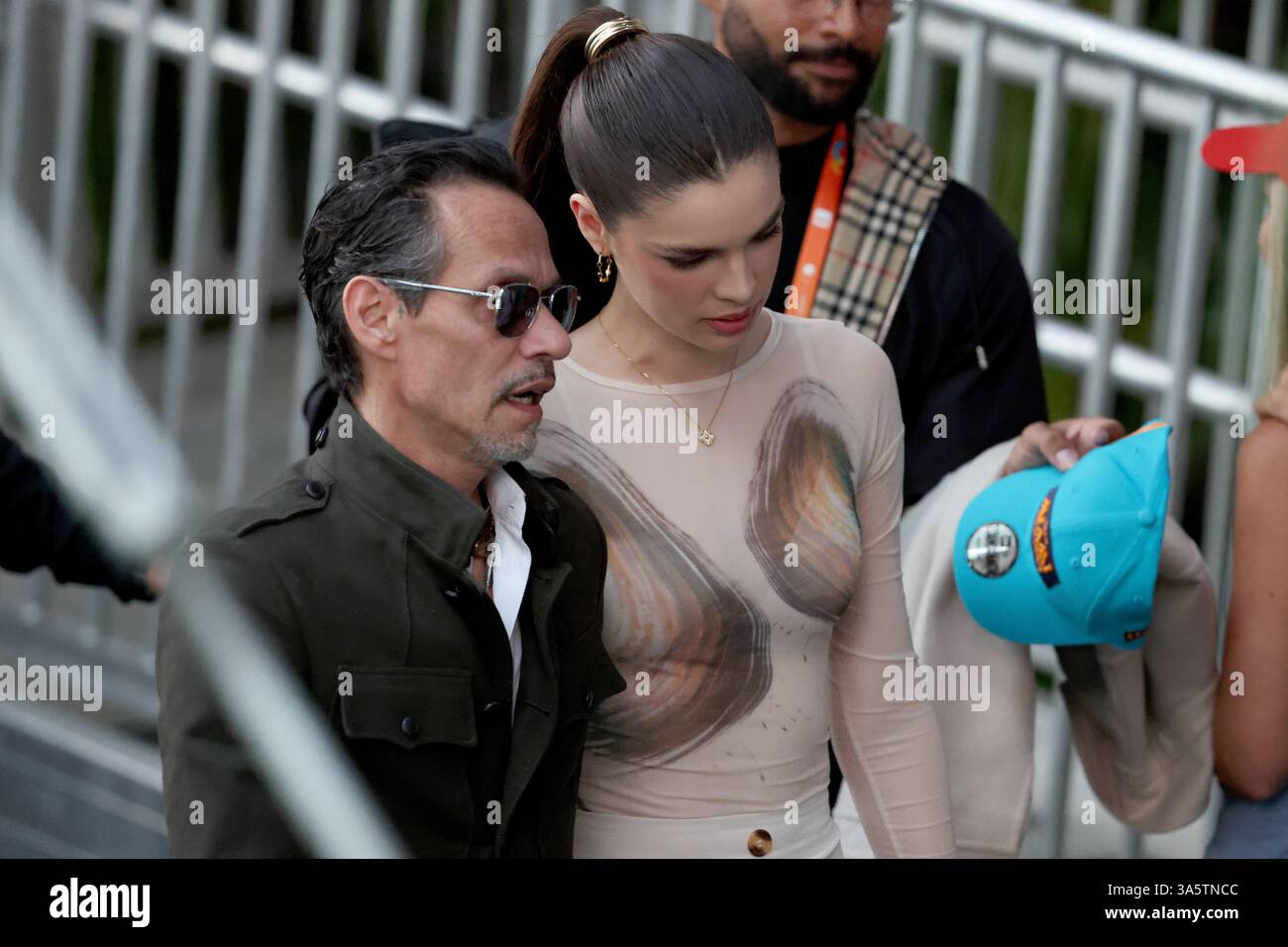 Miami Gardens, Florida, USA. 23rd Mar, 2025. Marc Anthony and his wife Nadia Ferreira attend the ...