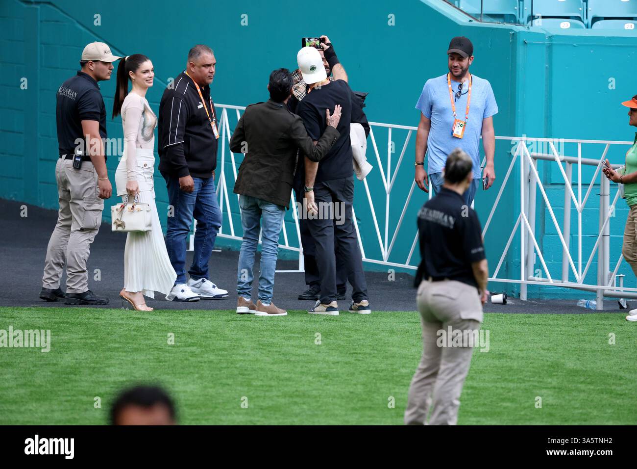 Miami Gardens, Florida, USA. 23rd Mar, 2025. Marc Anthony and his wife Nadia Ferreira attend the ...