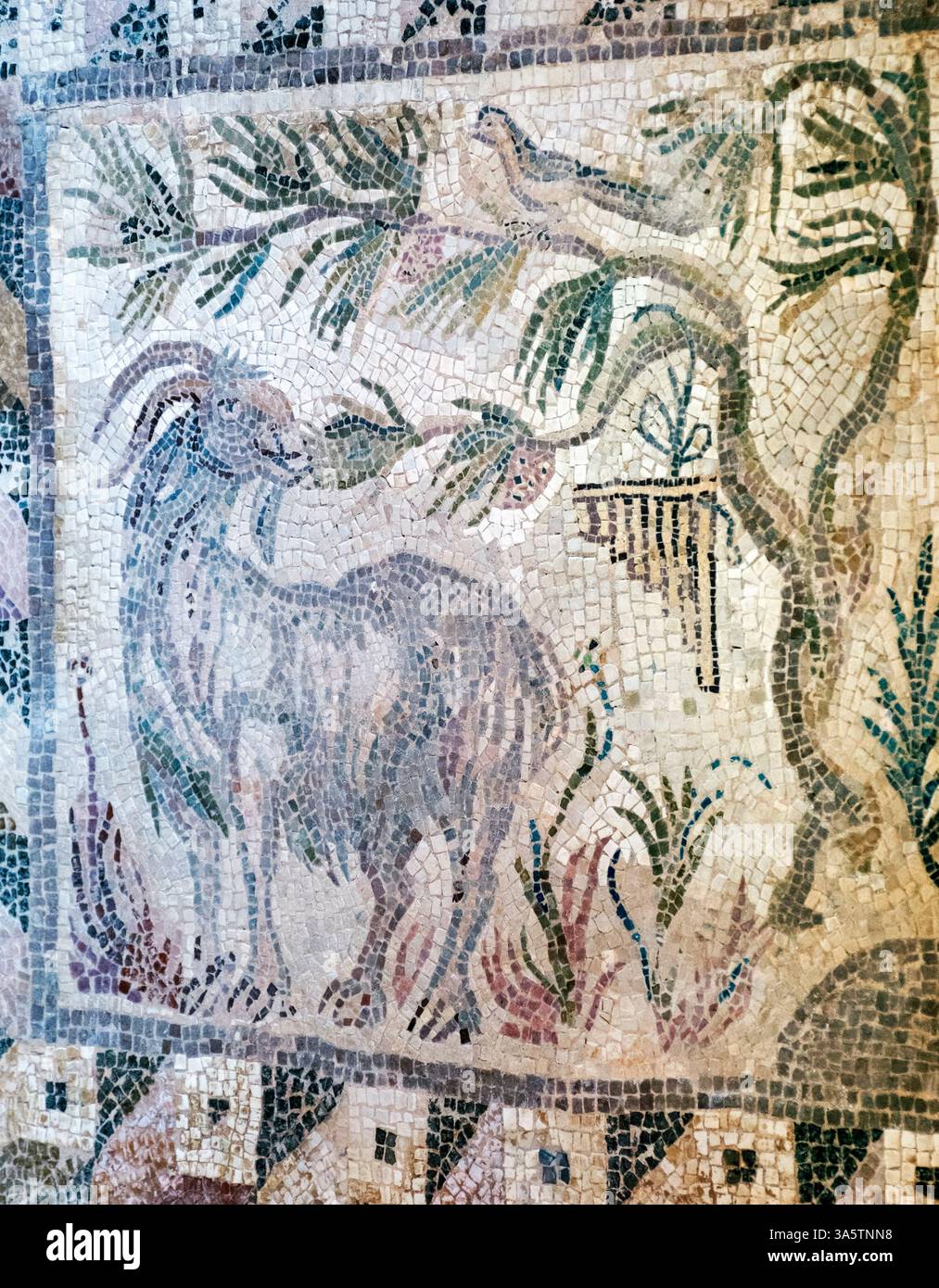 Roman mosaic depicting a goat feeding from a tree from a panel of the ...