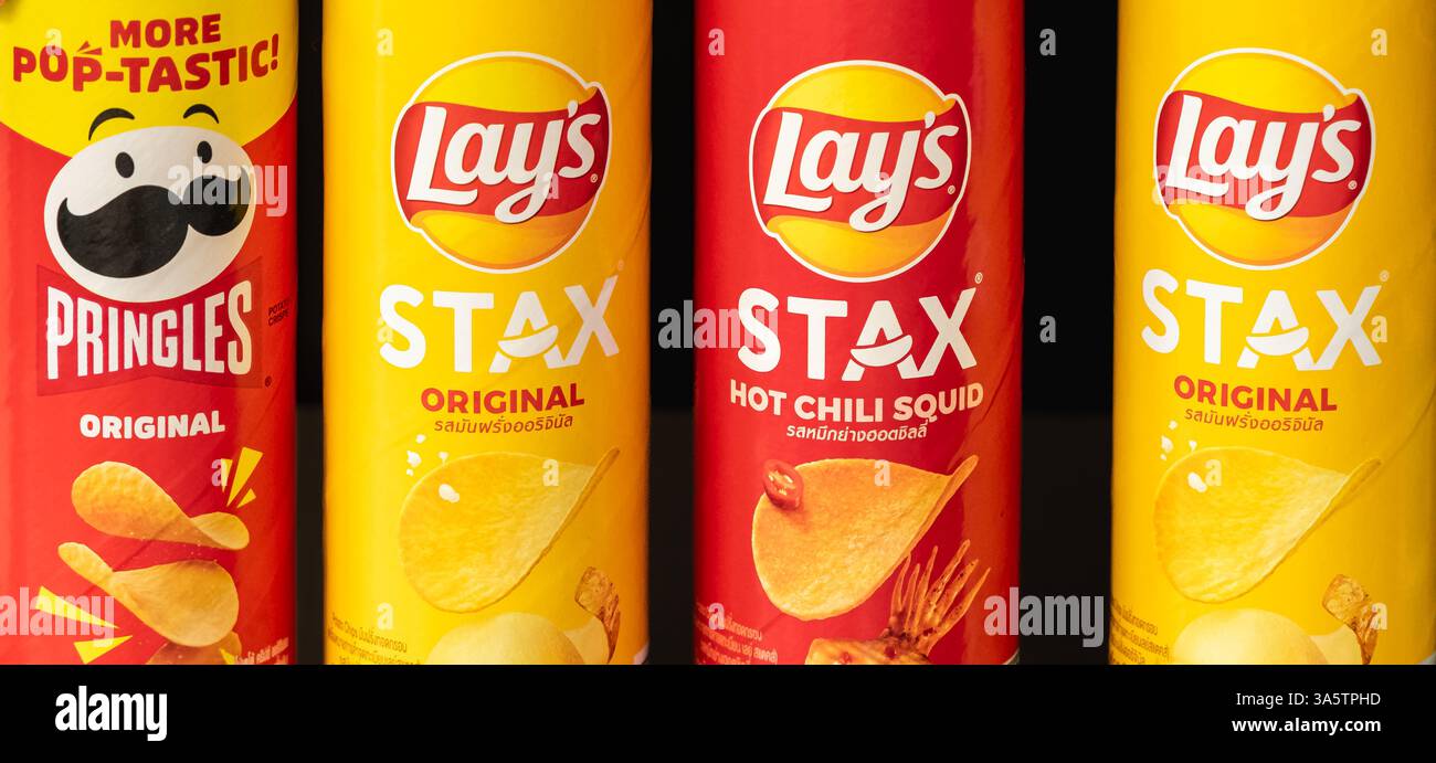 Close up of Various Pringles Potato Chip on market shelves. Colorful ...