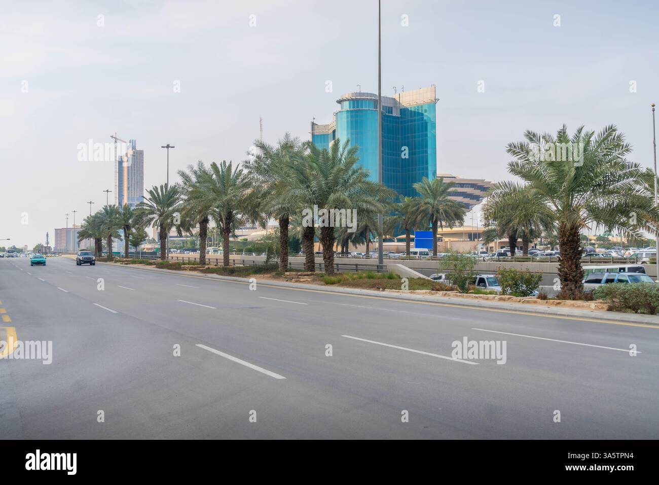 The empty highway in Riyadh downtown, with office buildings and road ...