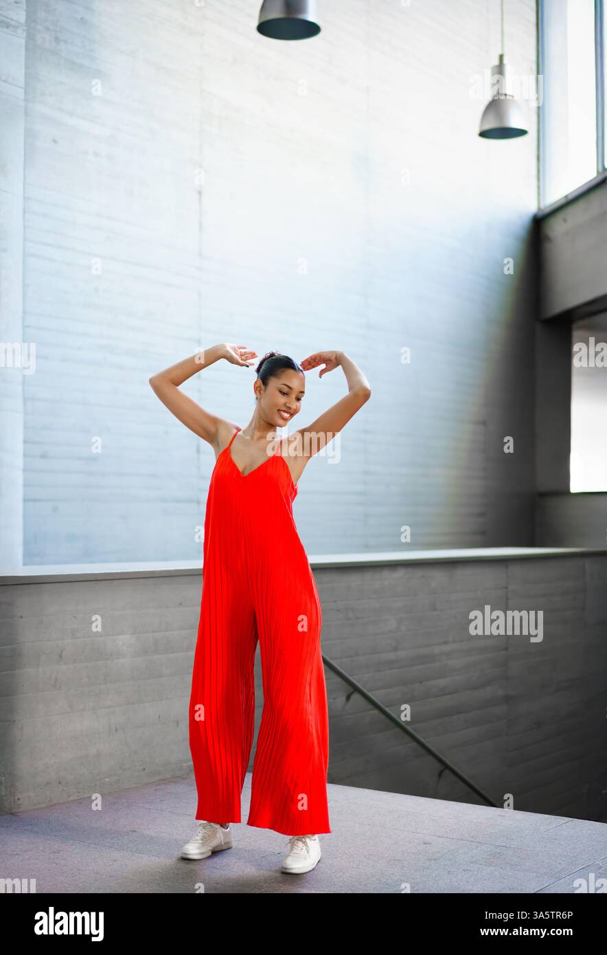 An Elegant Dance Pose Captured in a Stunning and Vibrant Red Outfit ...