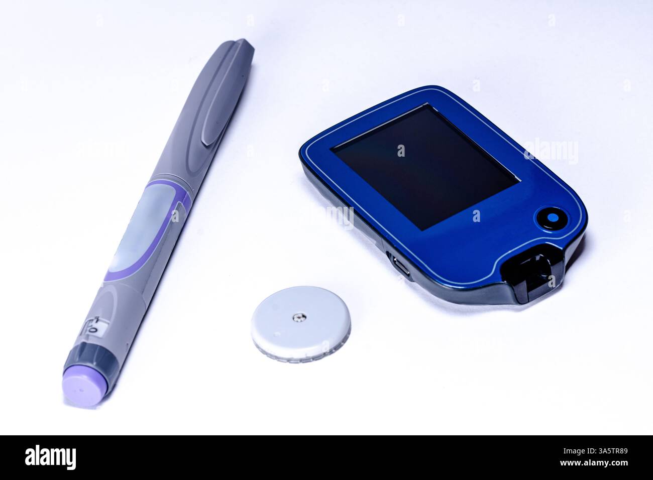 Insulin pen, continuous glucose monitoring system and sensor on white ...