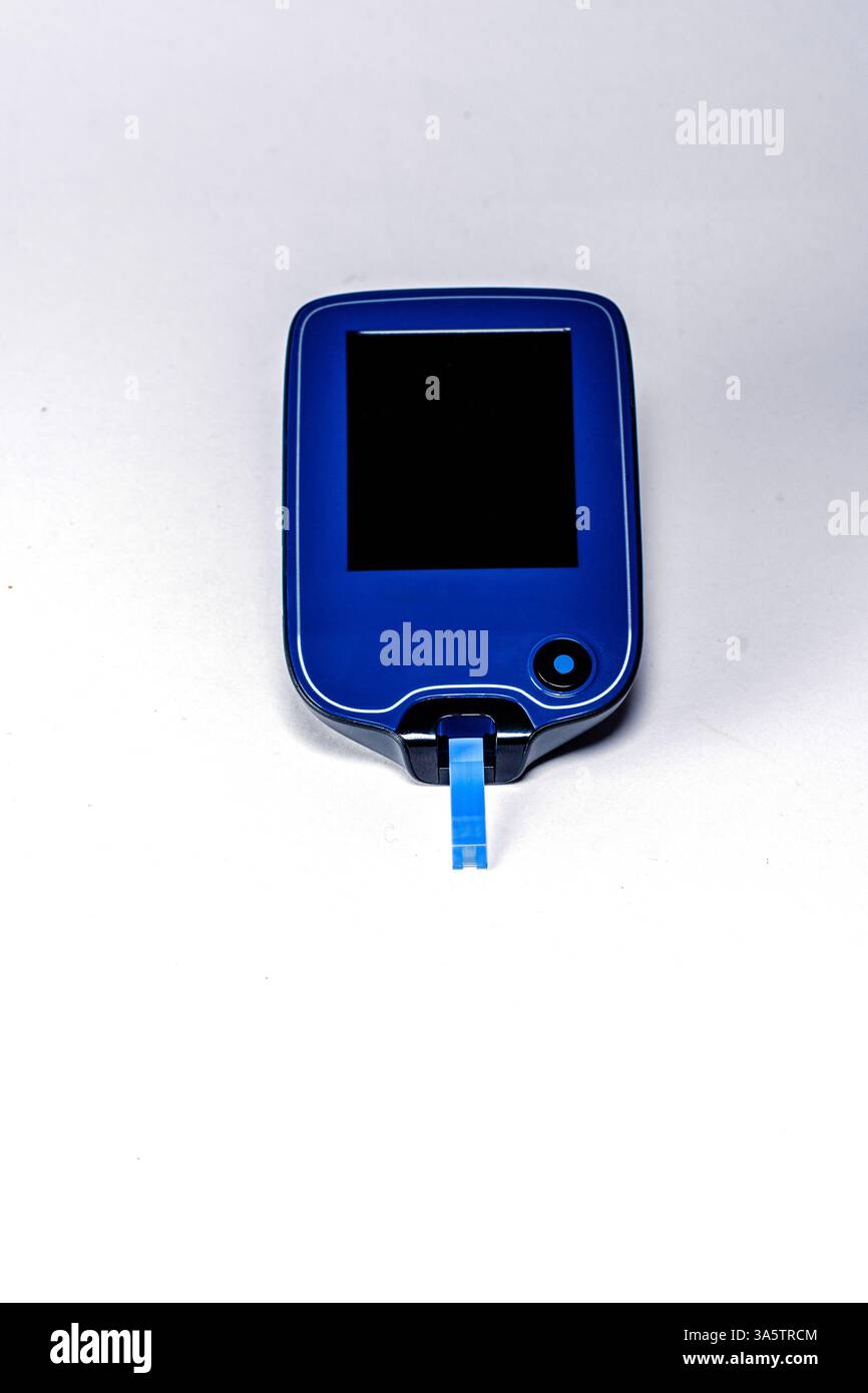 Portable glucose meter showing blank screen on white background Stock ...