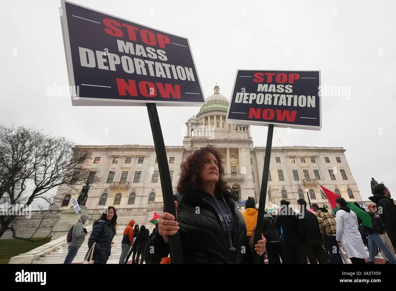 FILE - Protesters rally outside the Rhode Island State House in support ...