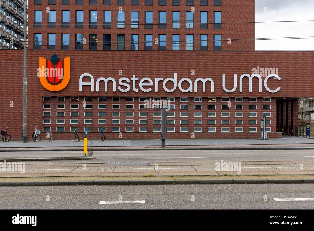 Amsterdam UMC Sign logo on the hospital. University Amsterdam UMC is a medical center that ...
