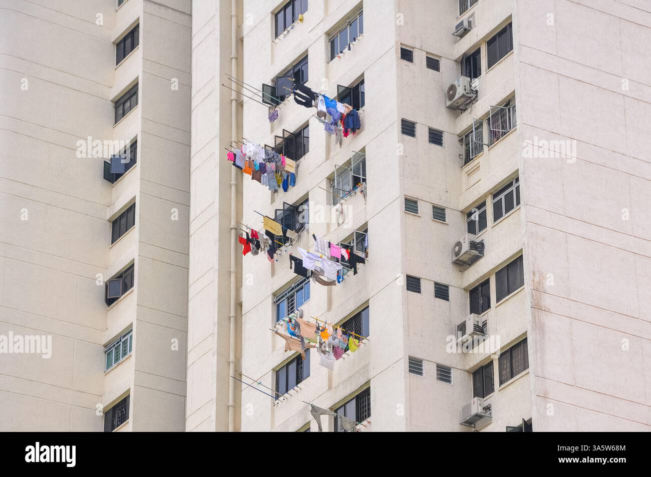 Singapore, Singapore - May 8, 2009: Clothes hanging on lines outside ...