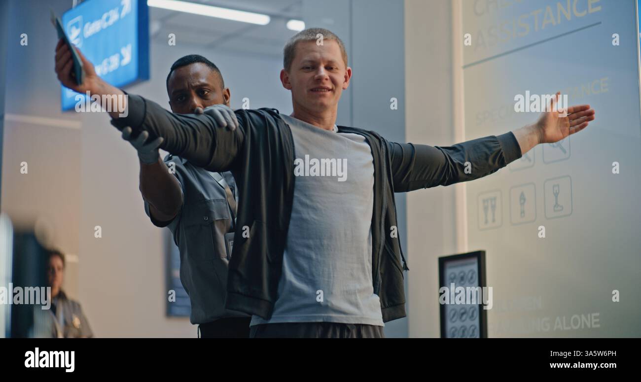 Security Checkpoint: African American TSA Officer Checking Young Man ...