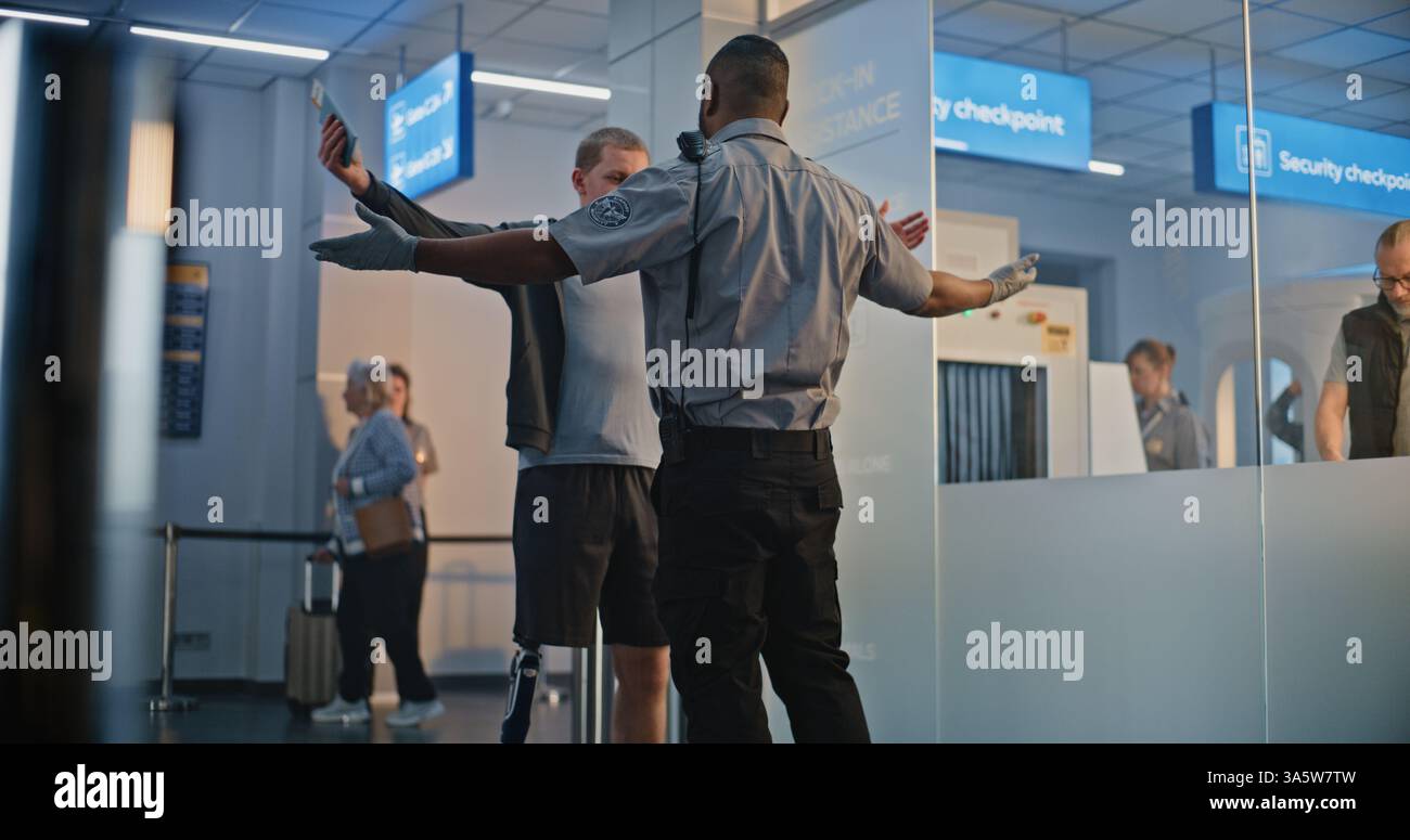Security Checkpoint: African American TSA Officer Checking Young Man ...