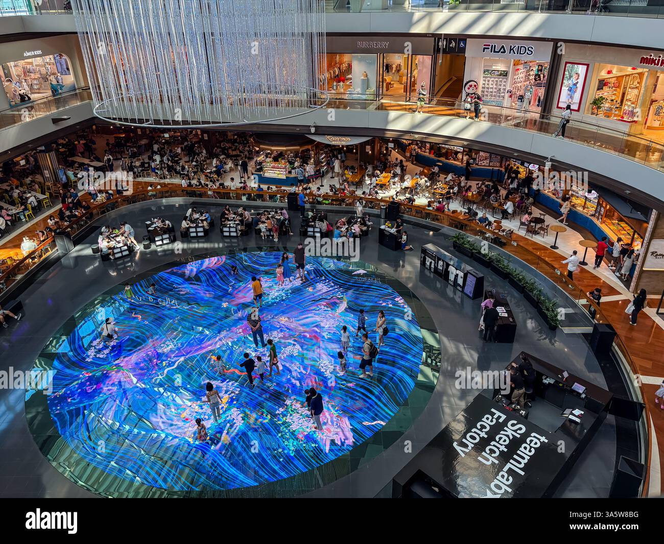 The marina bay sands shopping mall in Singapore is a luxurious ...