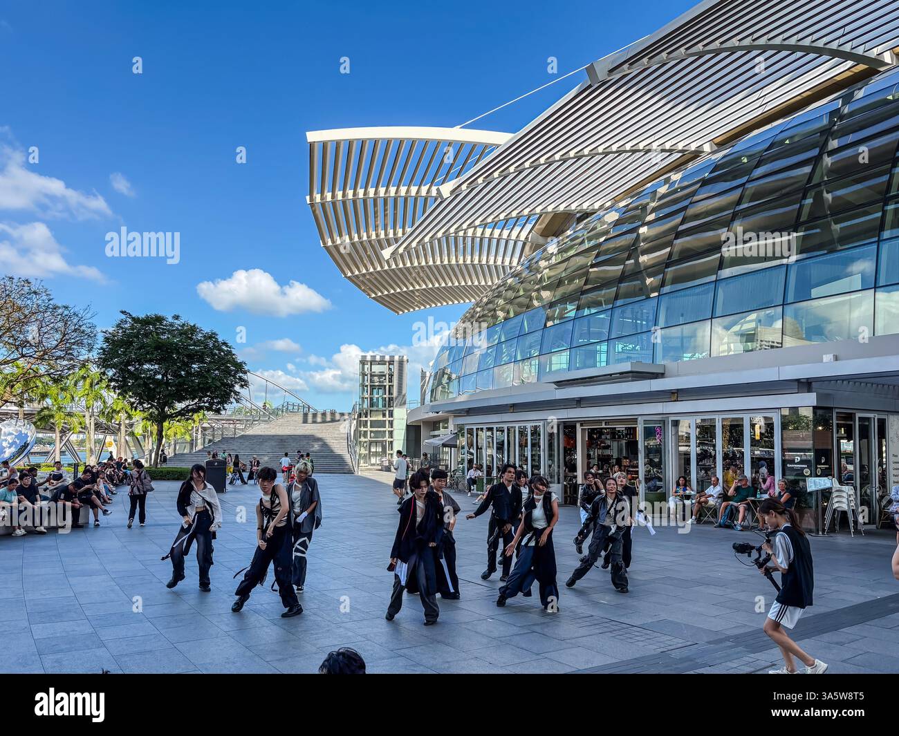 The marina bay sands shopping mall shows modern architecture. People ...