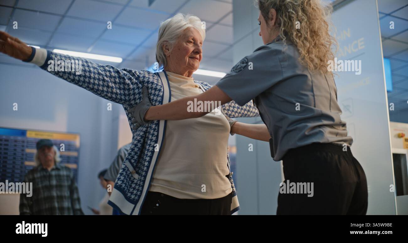 Security Checkpoint: Female TSA Officer Checking Elderly Woman Getting ...