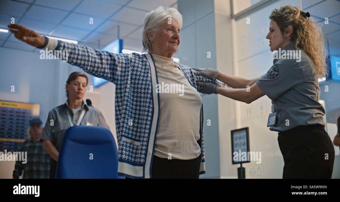 Security Checkpoint: Female TSA Officer Checking Elderly Woman Getting Up from Wheelchair in ...