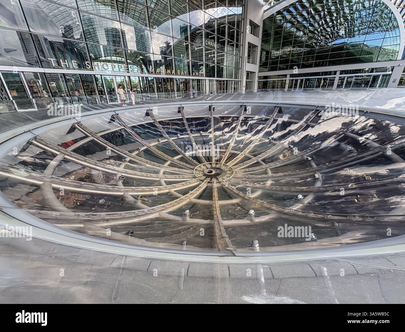 The Shoppes at Marina Bay Sands with its eye-catching architecture and ...