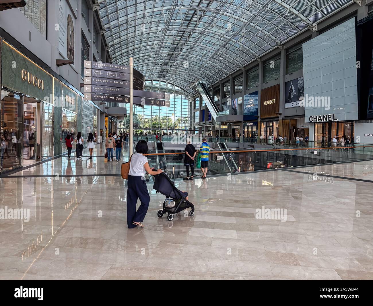 Marina Bay Sands Shopping Center is a large luxury shopping mall with ...