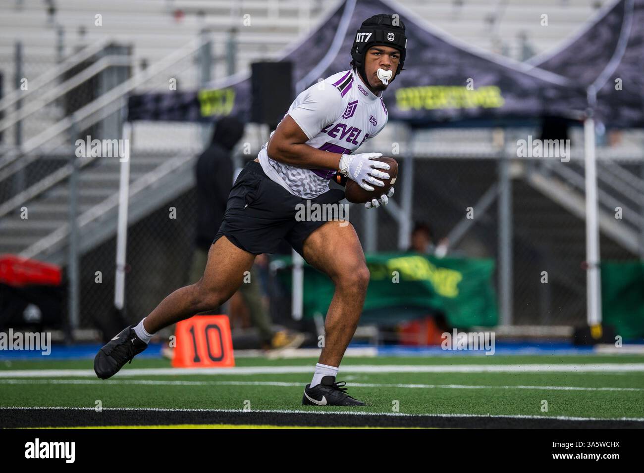 Level 82's Jackson Ford runs the football during OT7 Week 2 Sunday ...