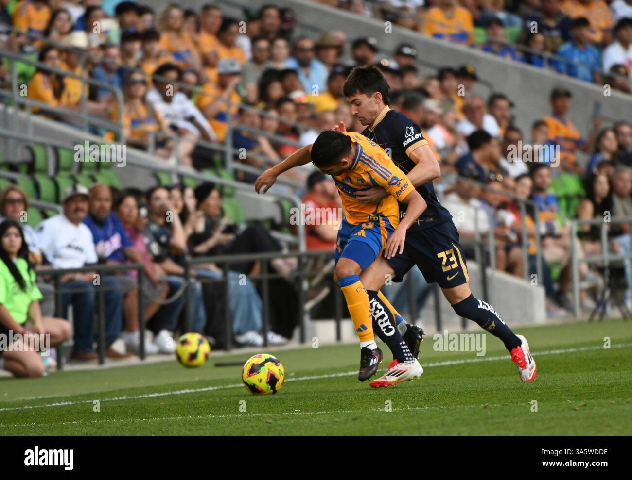 Austin, TX - MARCH 22: Tigres UANL defender Jesus Garza (left) gets ...