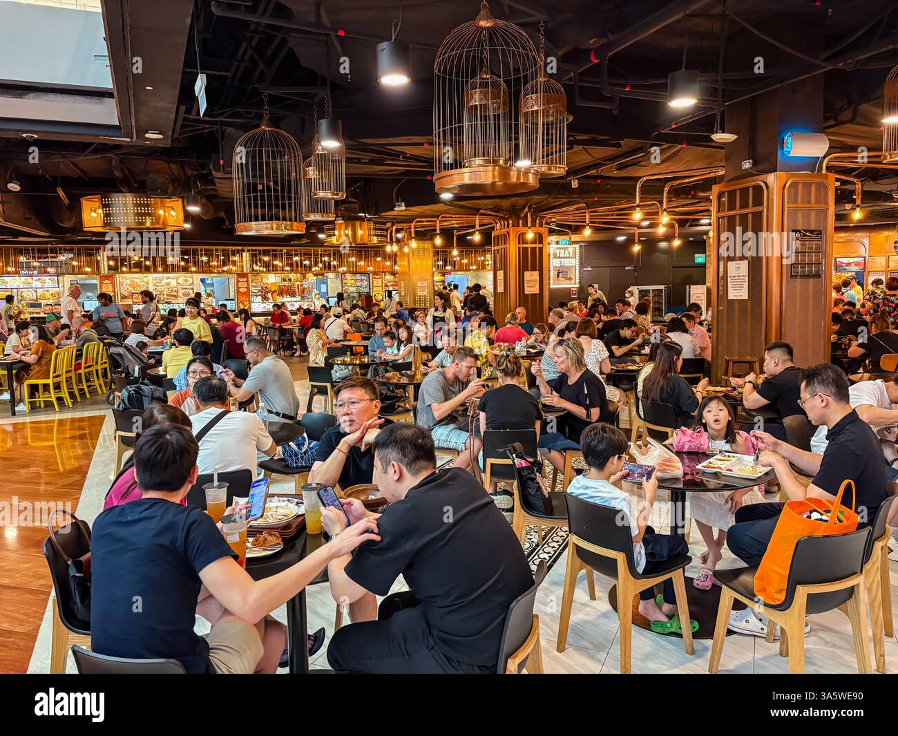 Busy food court inside the Marina Bay Sands Shopping Centre in ...