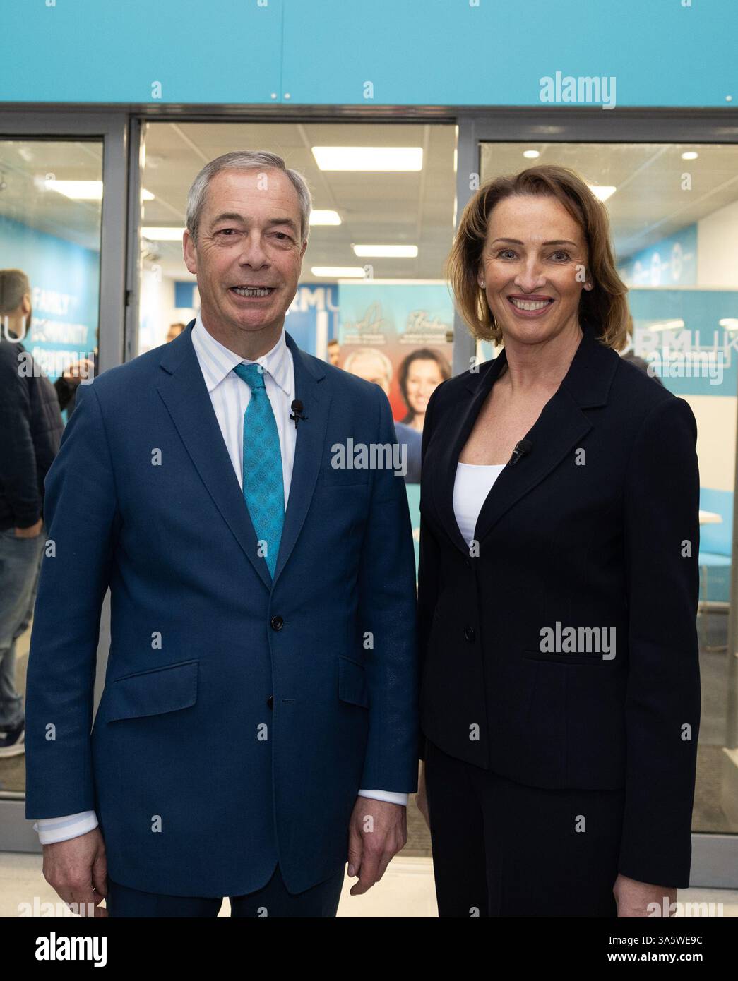 Reform UK leader Nigel Farage stands with Sarah Pochin after announcing ...