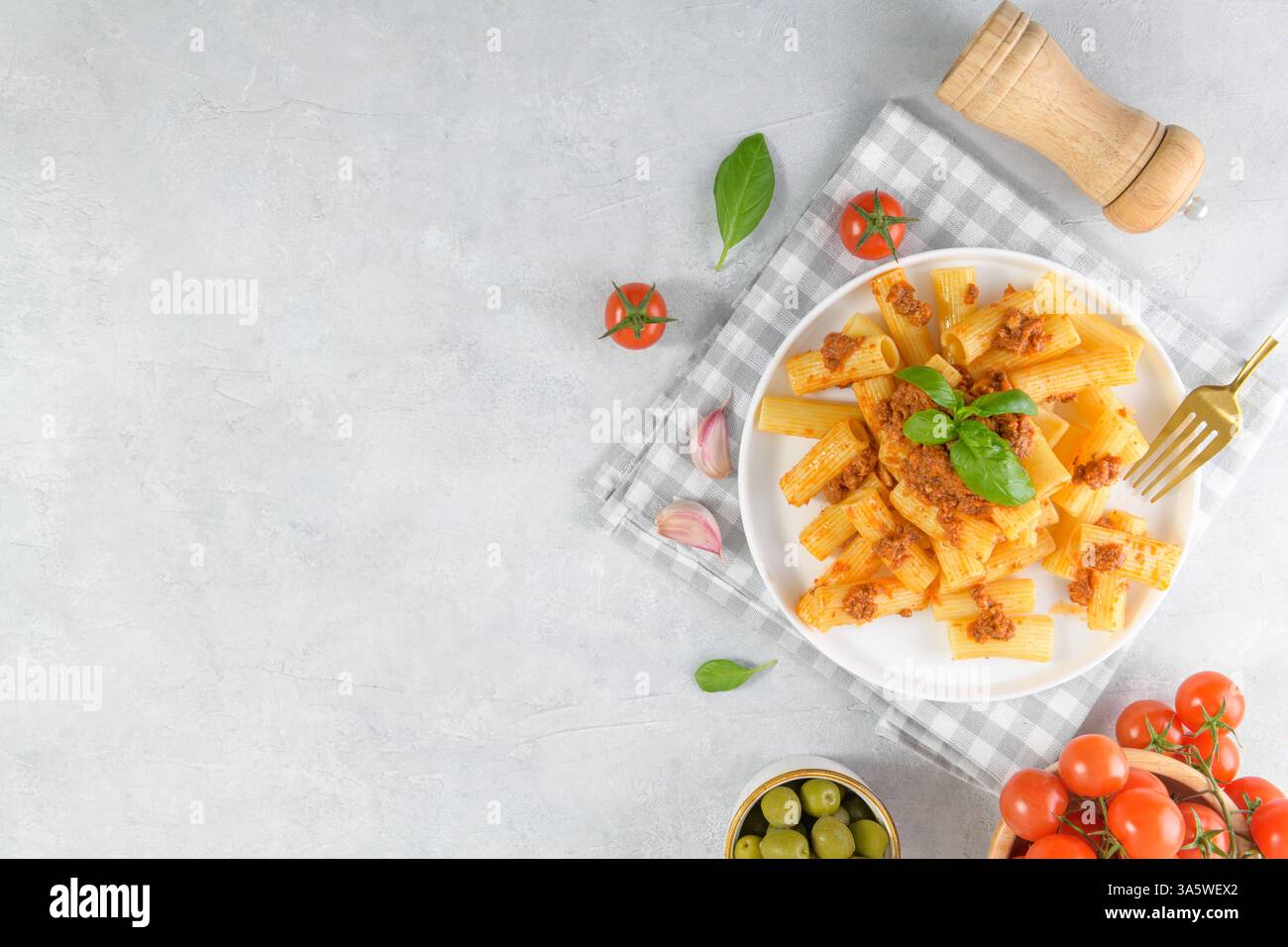 Italian rigatoni pasta with hearty Bolognese ragu sauce, overhead view ...