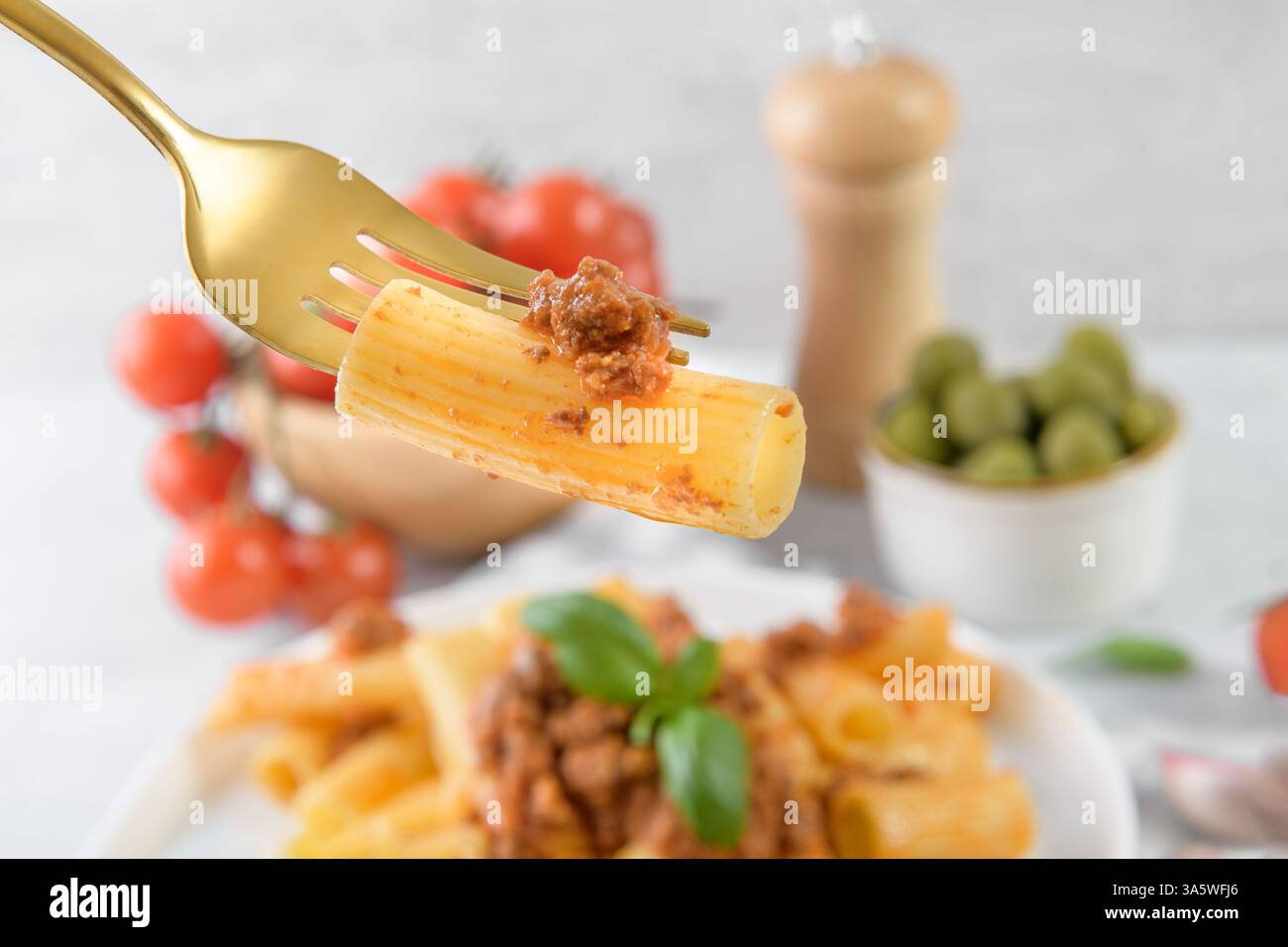 Italian rigatoni pasta with authentic Bolognese ragu sauce, styled ...