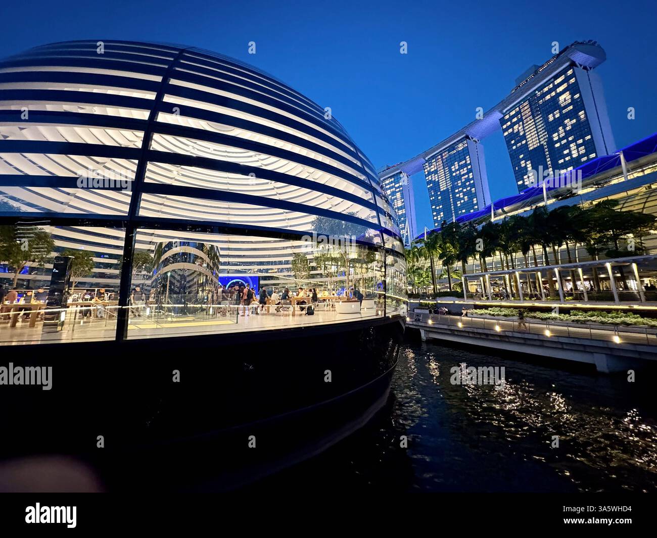 Apple store at Marina Bay Sands, Singapore. The iconic dome sits on the ...