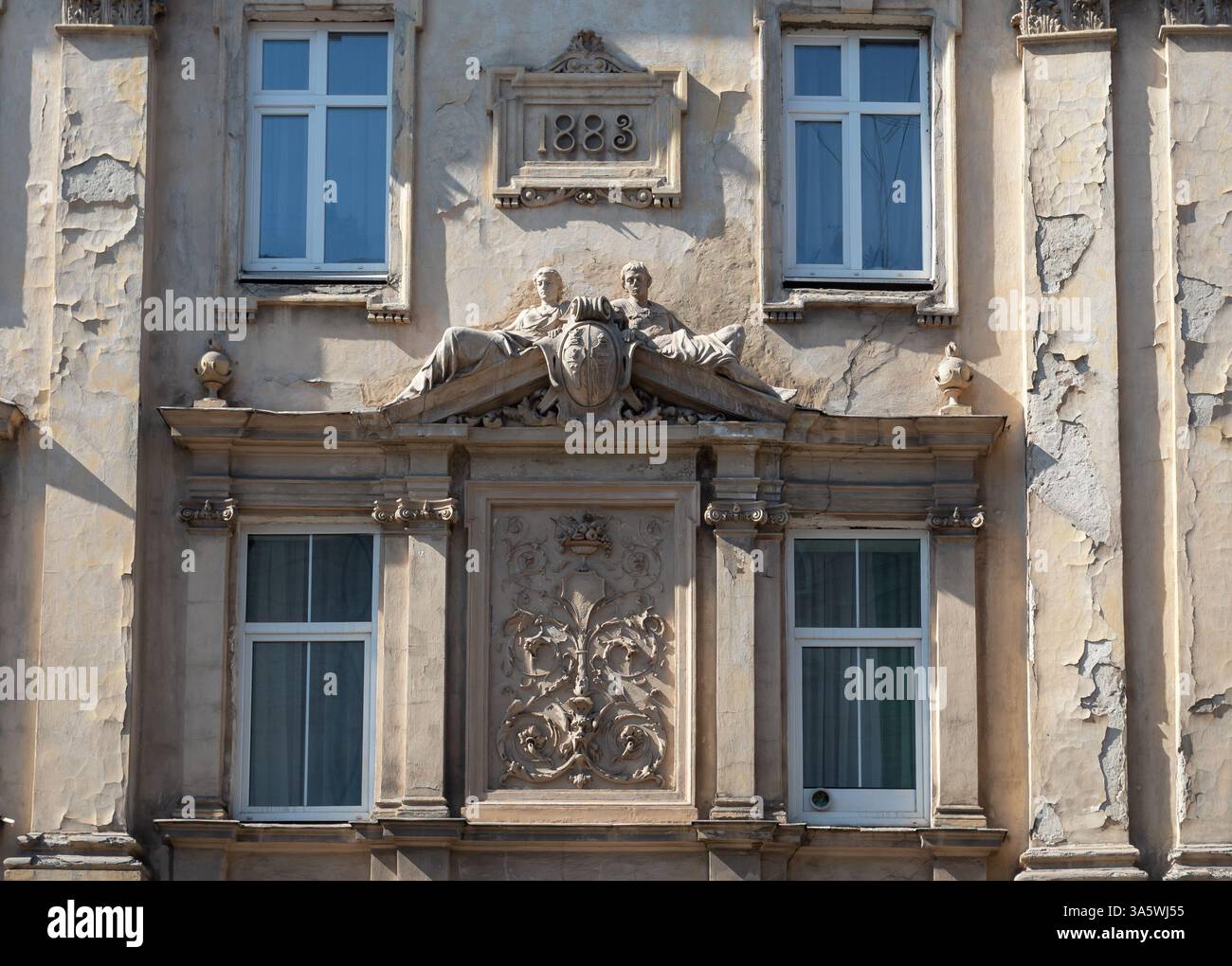 Lviv, Ukraine - Mar. 22, 2025: A detailed view of a historic facade in Lviv capturing ornate ...