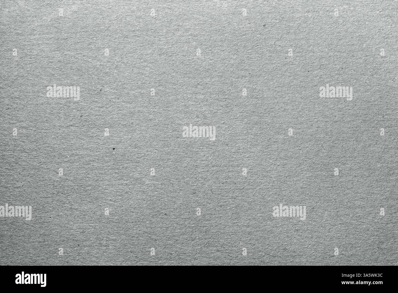 Gray cardboard texture, close-up. Neutral, rough surface with visible ...