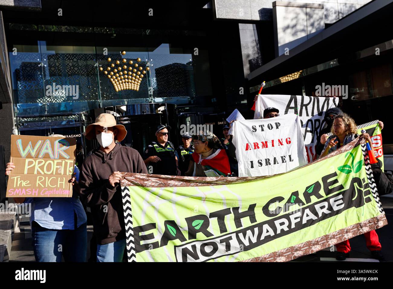 Demonstrators seen holding banners and chanting during a protest ...