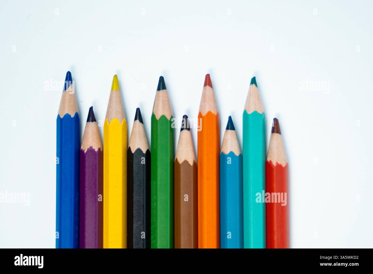 A visually appealing photo of colorful pencils arranged in a creative ...