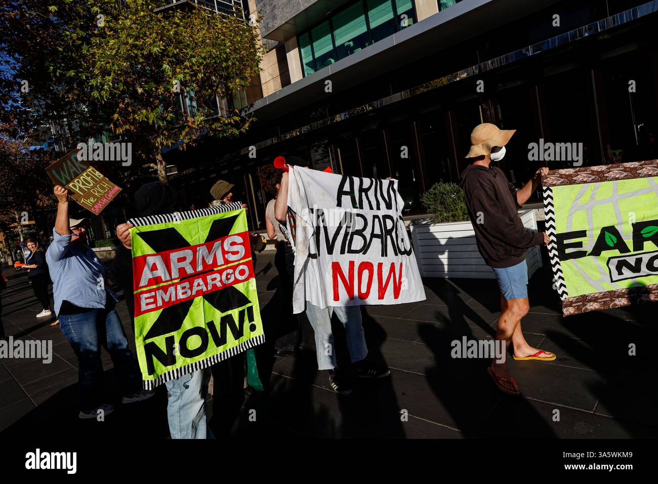 Demonstrators seen holding banners and chanting during a protest ...
