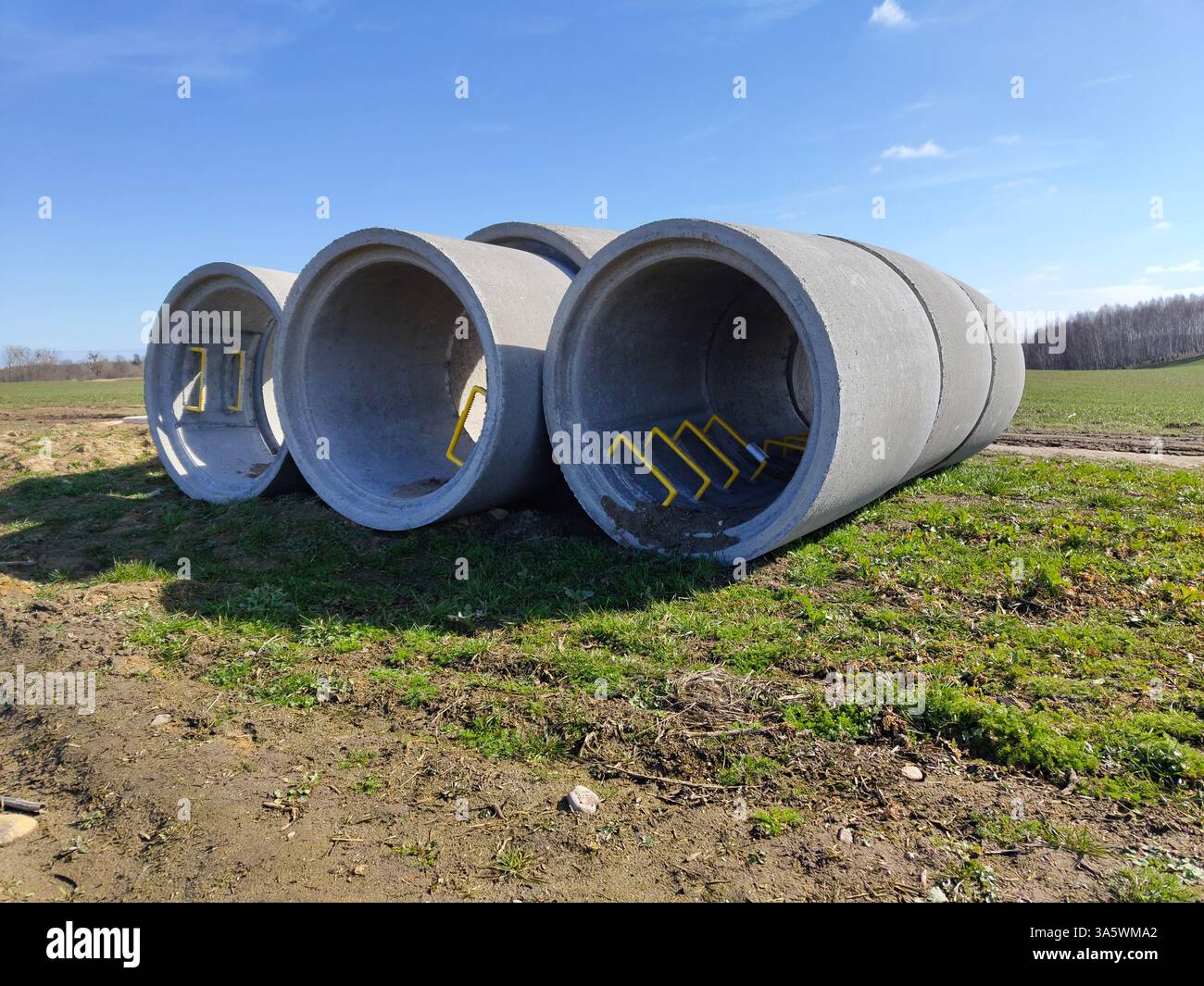 Cylindrical pipes laying hi-res stock photography and images - Alamy