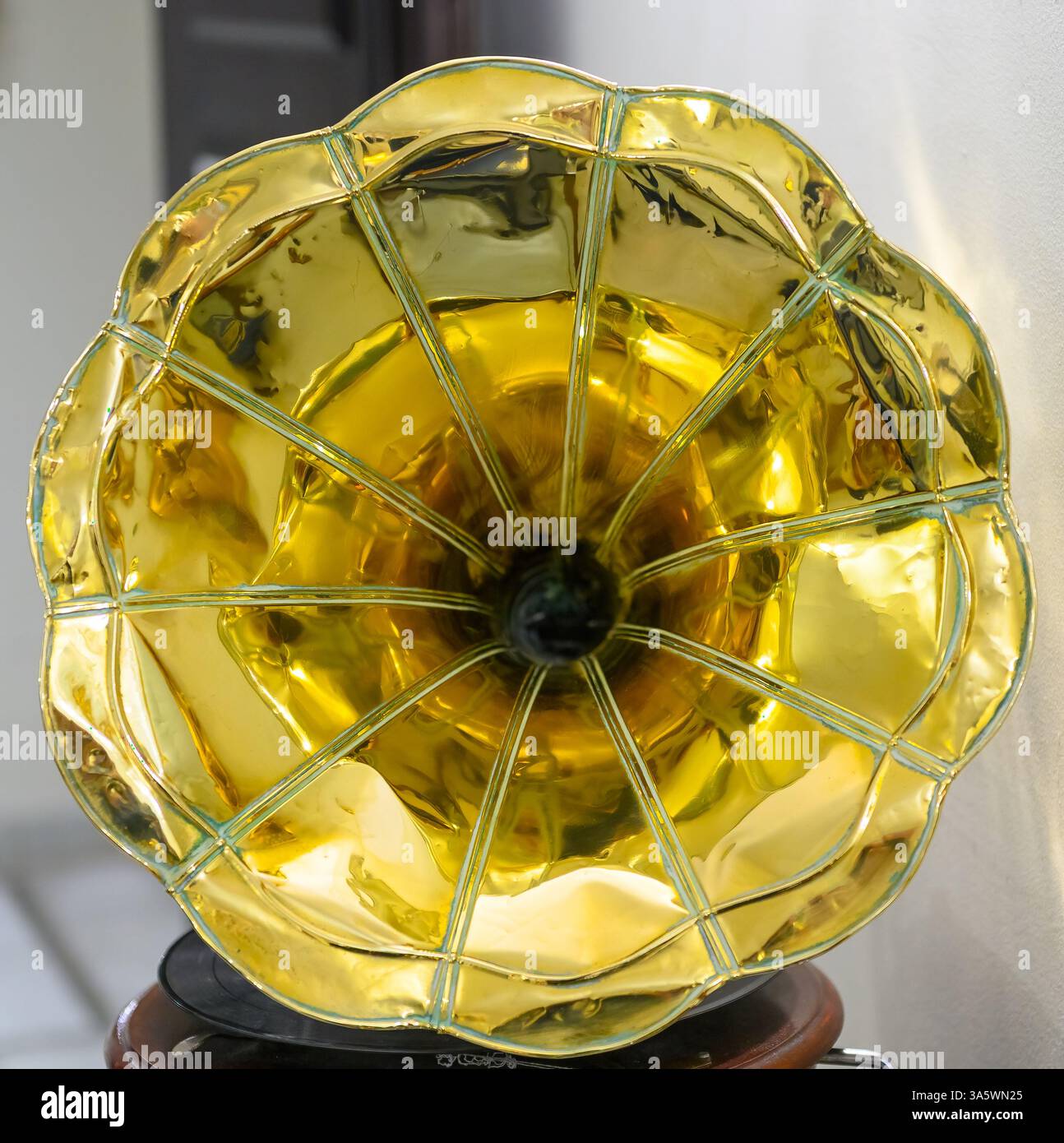 Ancient gold-colored megaphone in antique music equipment Stock Photo ...