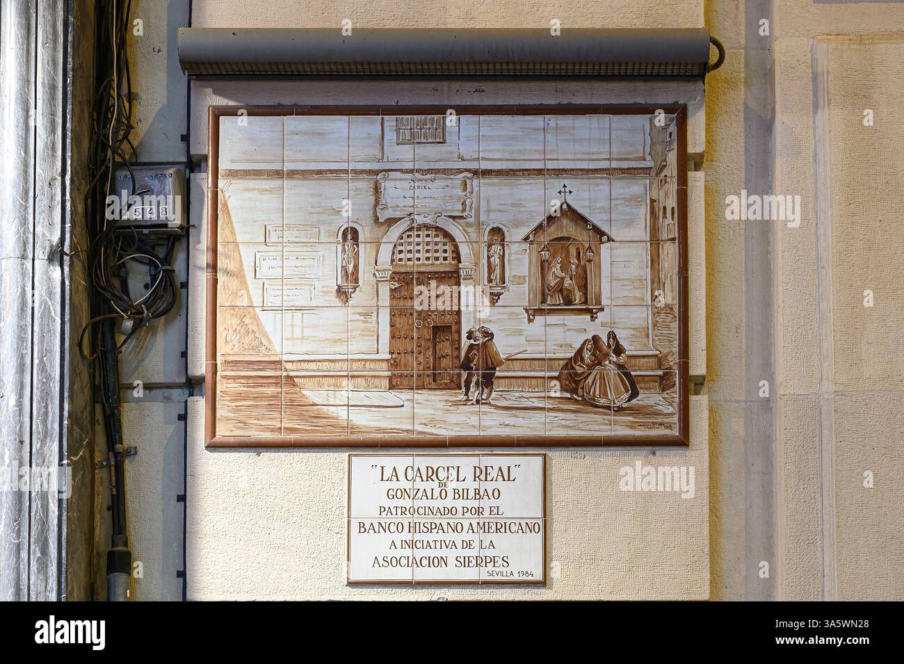 Ancient tile historic sign on a building facade depicting the Royal ...