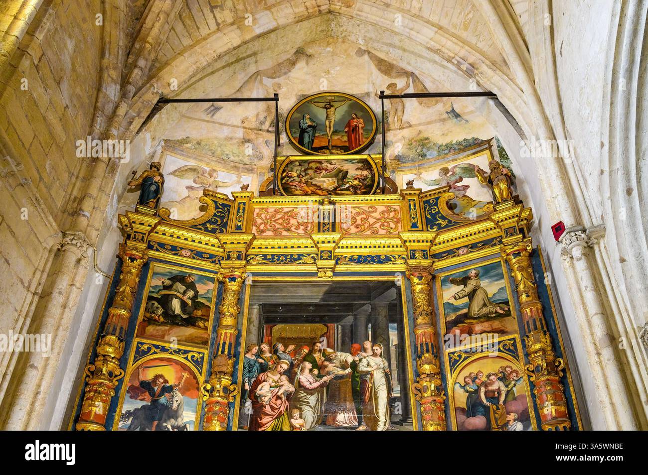 Ancient altar with medieval art in the interior of the Seville ...