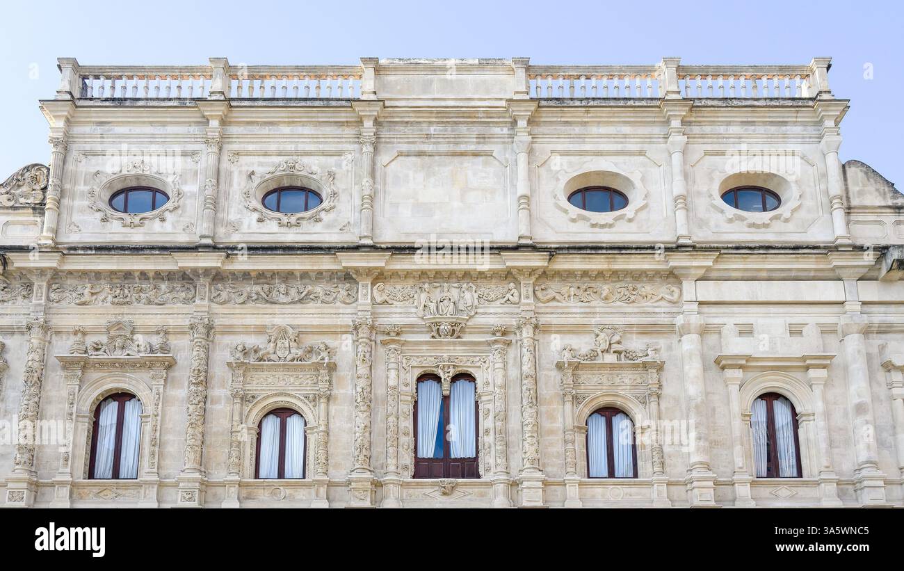 Stone wall and windows, architectural features of the Casa Consistorial ...