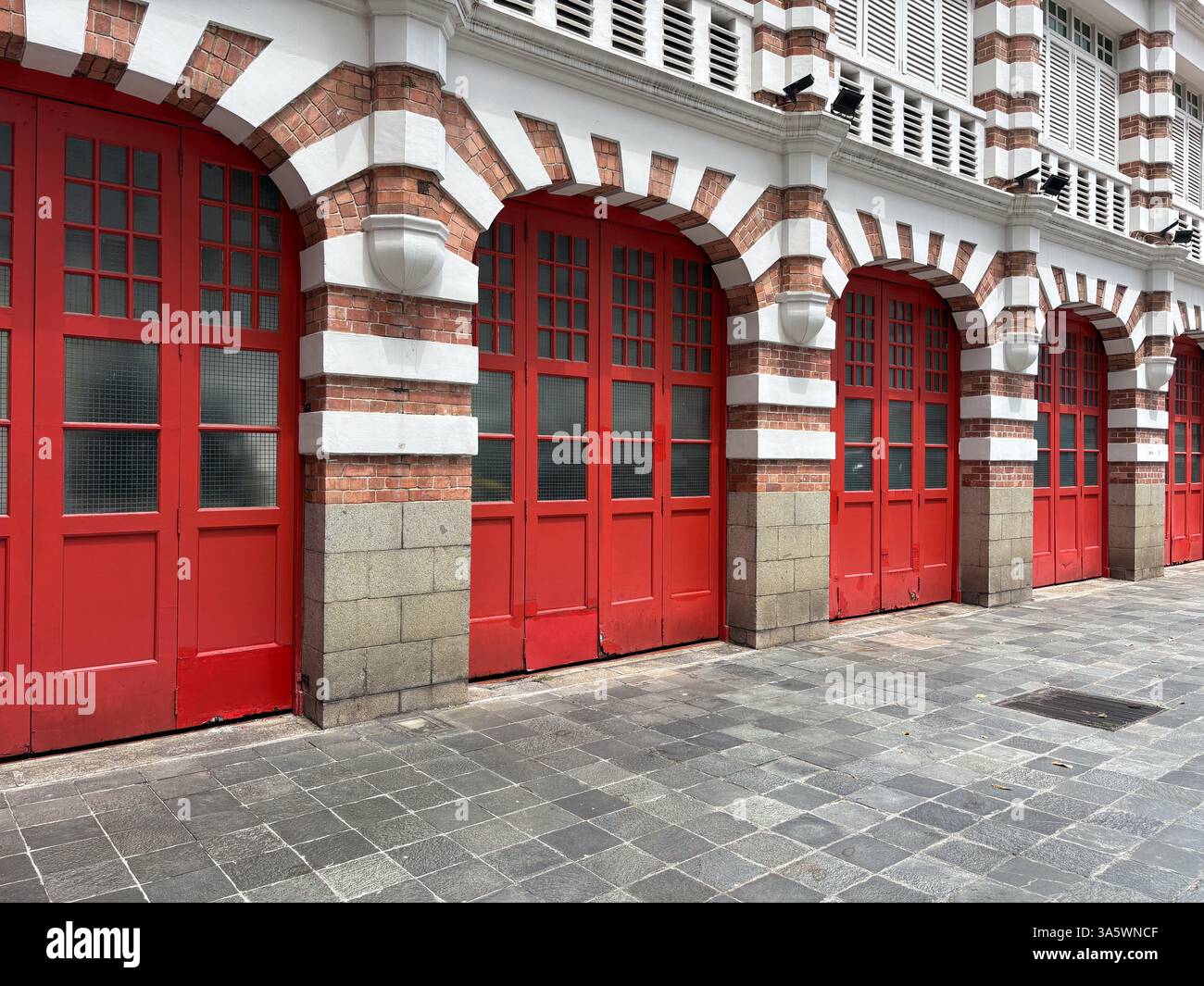 Central Fire Station in Singapore. A historic fire station with red ...