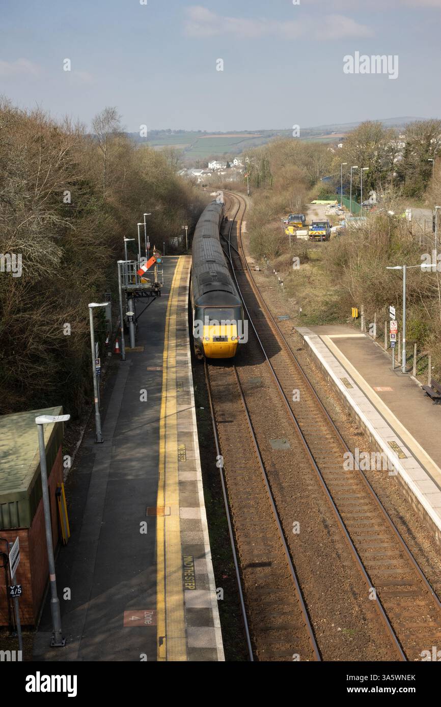 Train going west at Liskeard Cornwall in spring sunshine station Stock ...