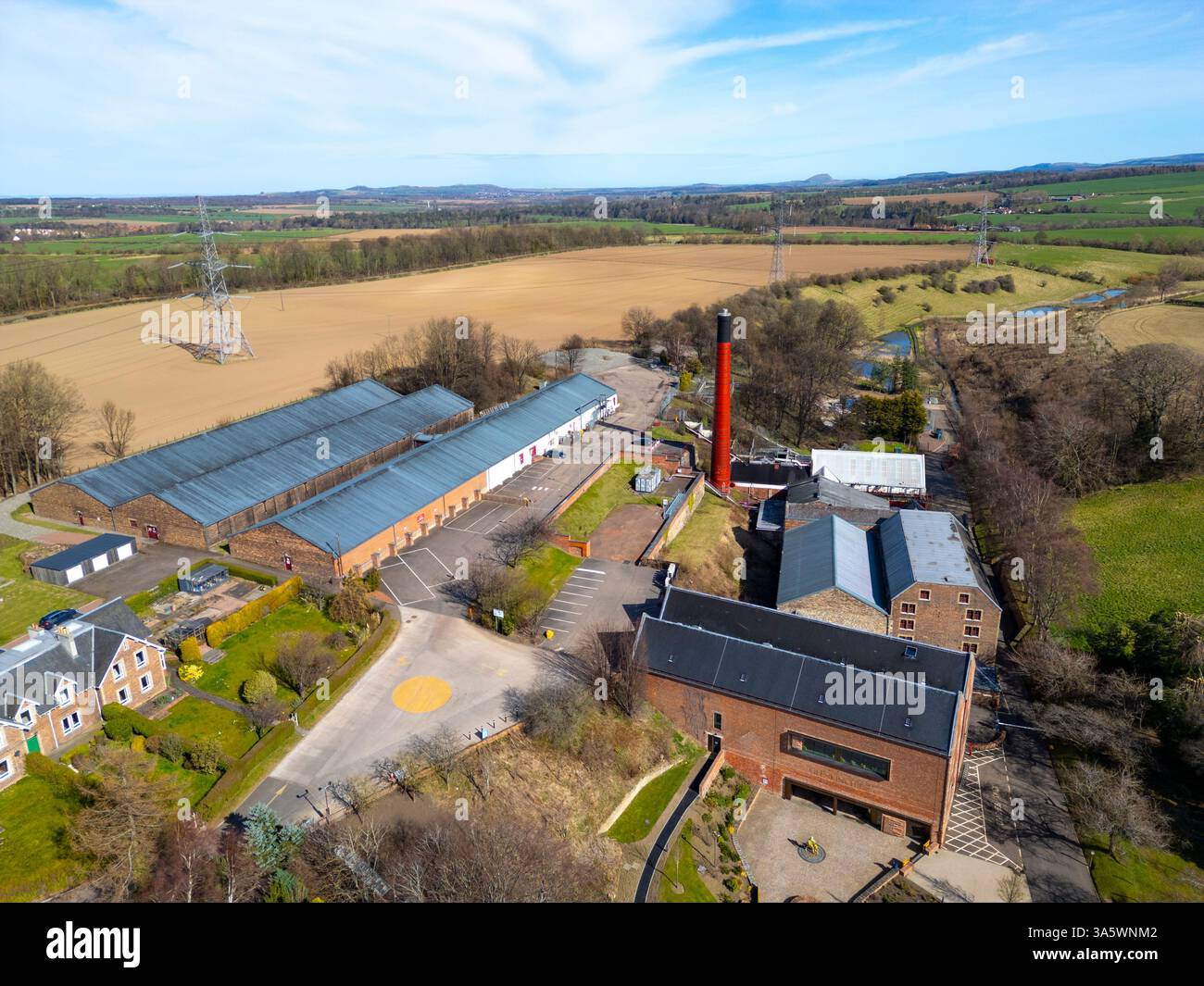 Aerial view of Glenkinchie Scotch Whisky distillery, in Peastonbank ...