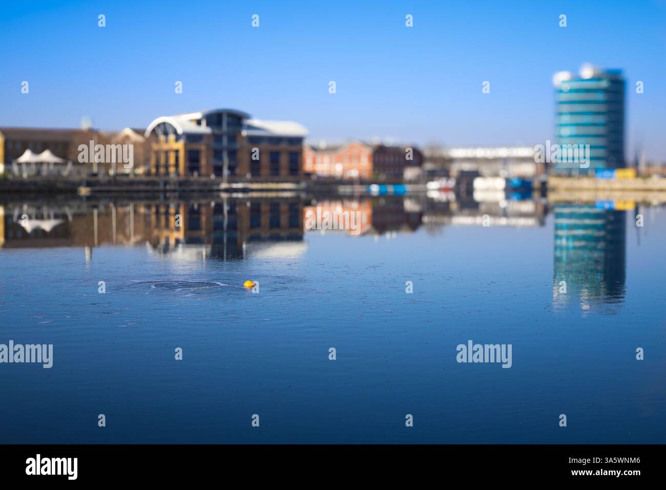 Modern waterside properties and apartments surrounding marina at ...