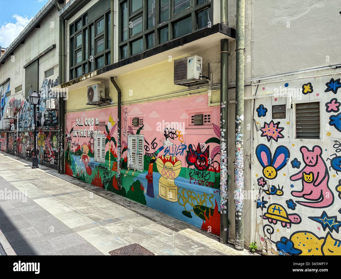 Haji Lane colorful wall murals of cartoon figures and graffiti. This ...