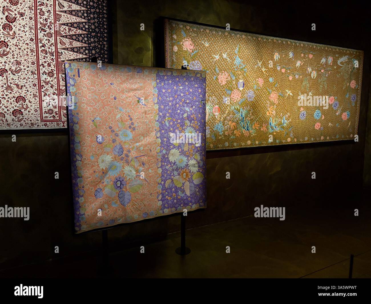 Colorful batik cloths in a museum, featuring unique patterns and ...