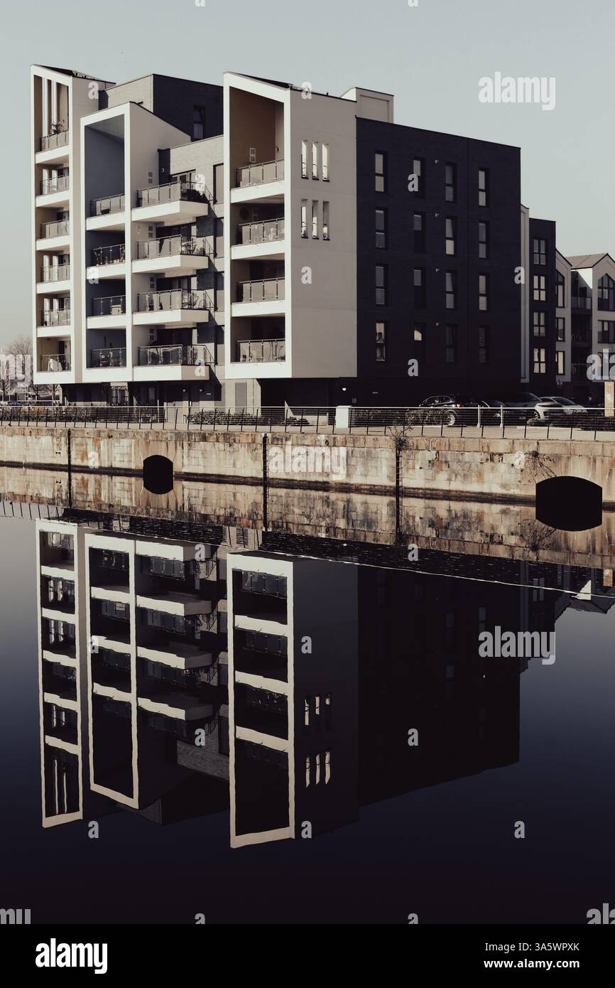 Modern waterside properties and apartments surrounding marina at ...