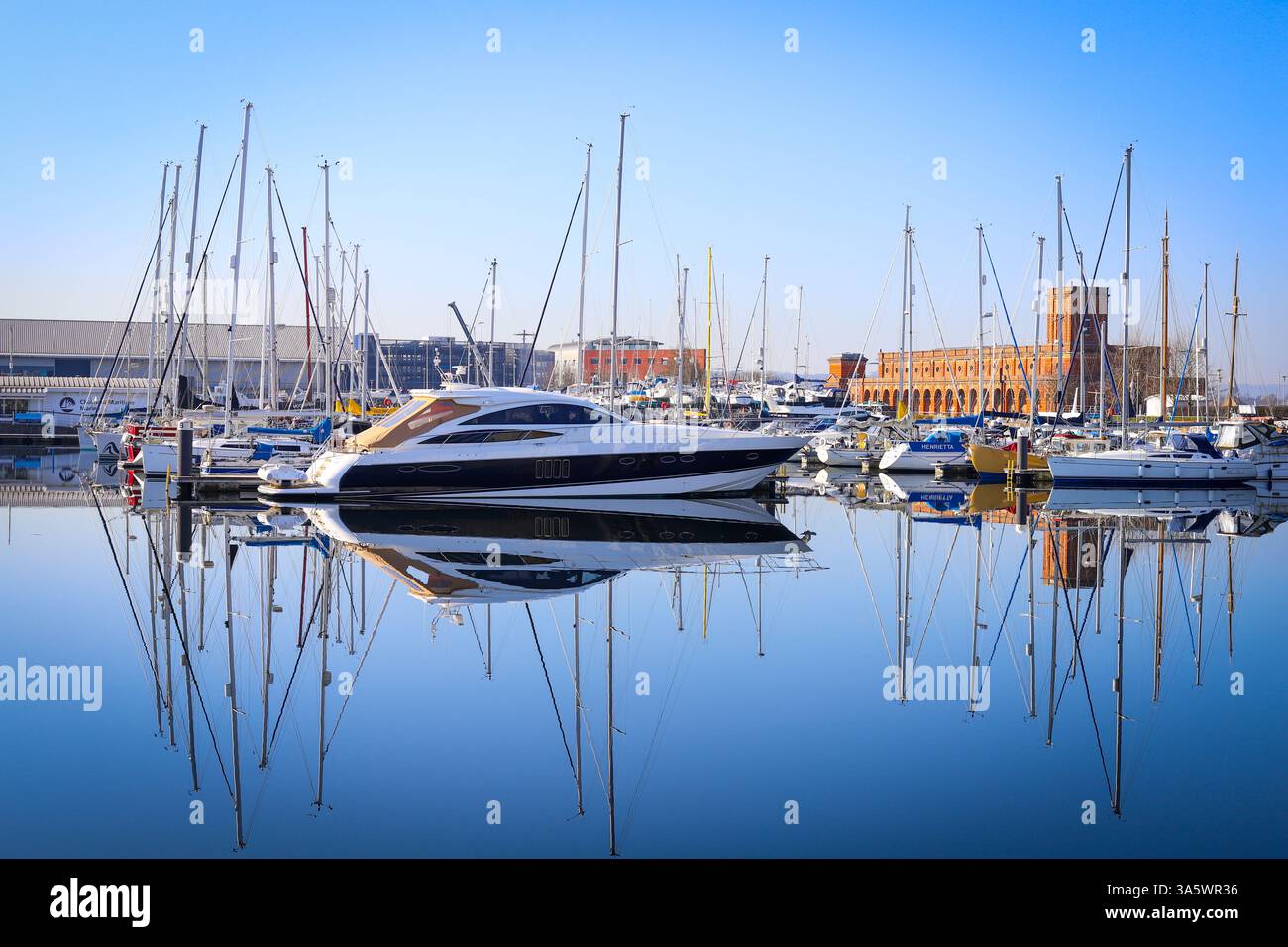 Modern waterside properties and apartments surrounding marina at ...