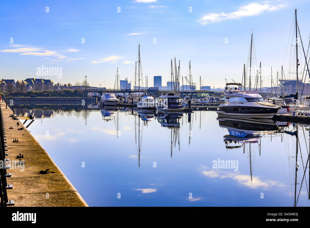 Modern waterside properties and apartments surrounding marina at ...