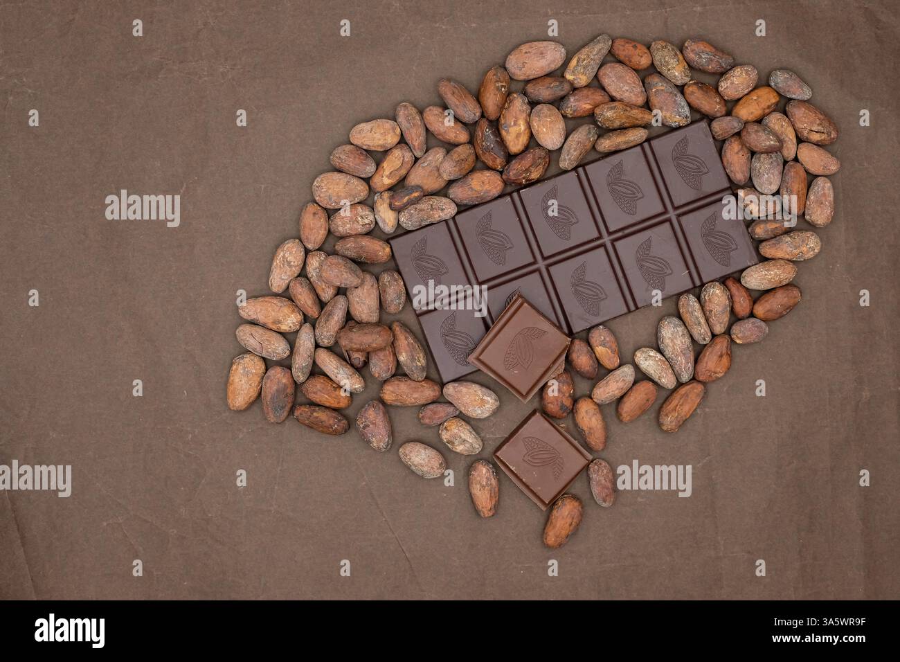 Cocoa fruit is designed from chocolate bar and cocoa beans. Chocolate color tissue paper ...