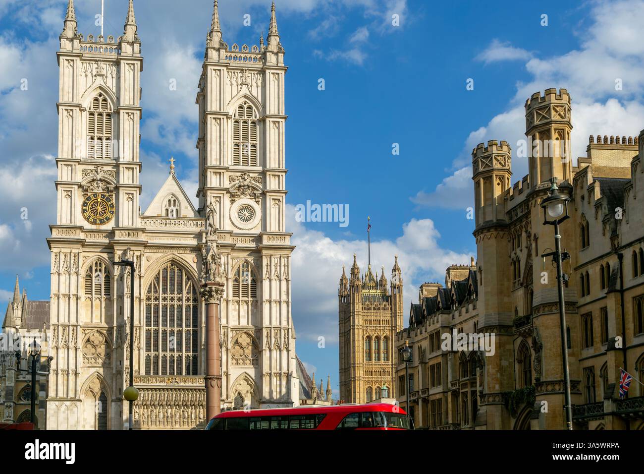 Towers and frontage of Westminster abbey church with Victoria Tower in ...