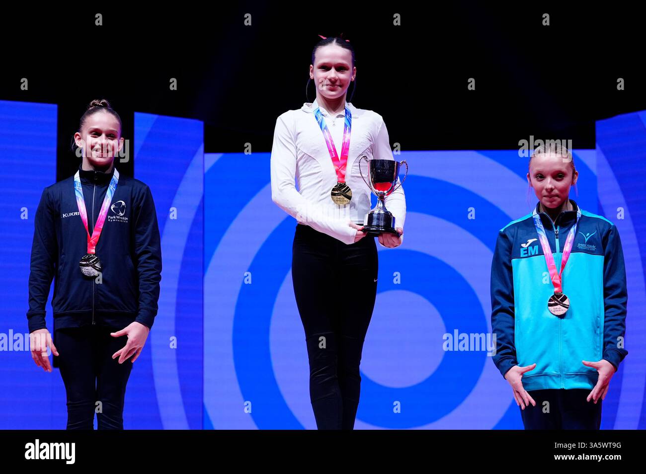 (left to right) Helena Finc with the silver medal, Lexi Holmes with ...