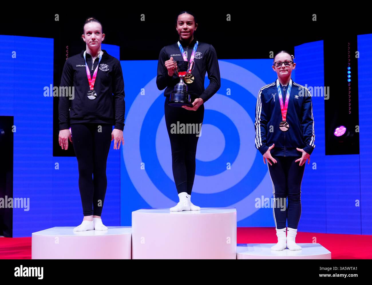 (left to right) Simone Seed with the silver medal, Andrea Ndoro with ...