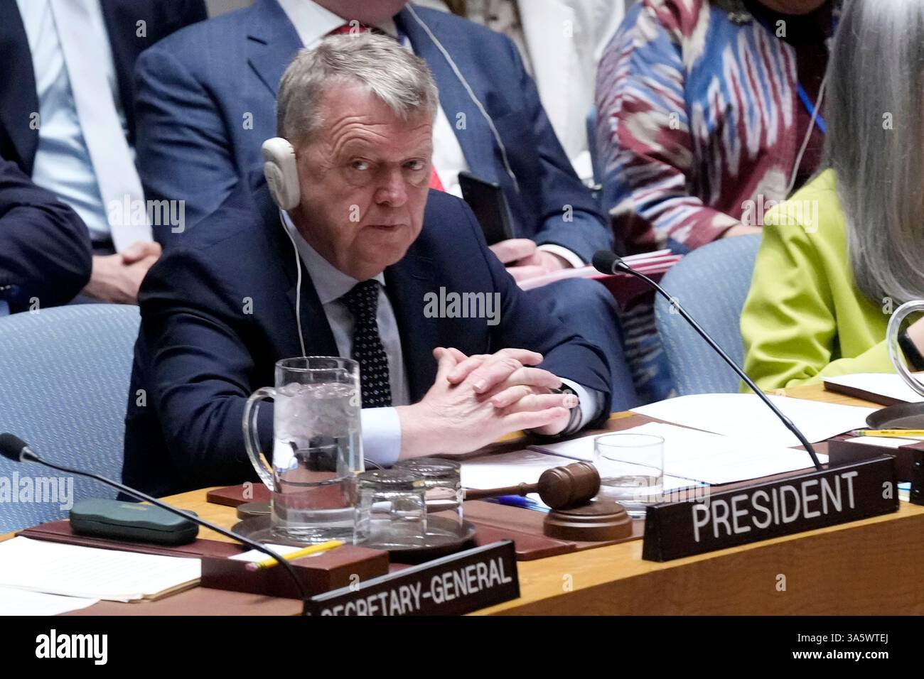 Denmark Foreign Minister Lars Lokke Rasmussen listens to remarks in ...